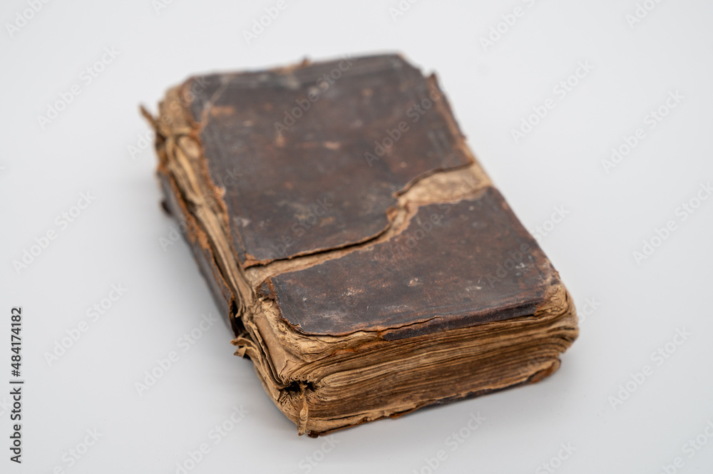 An Old Leather Covered Book Sits Flat With Worn Edges That Lighten The ...