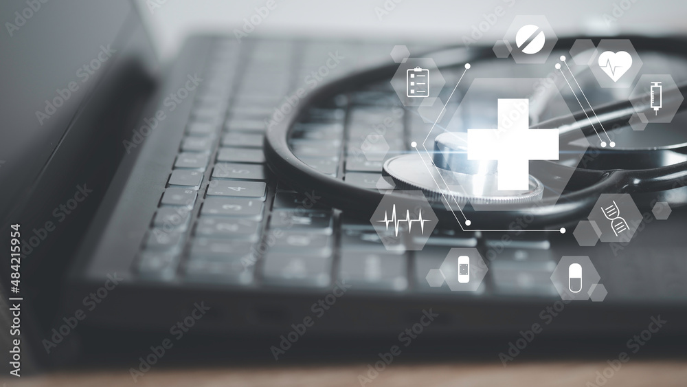 Close up of stethoscope and laptop keyboard. Digital healthcare and ...