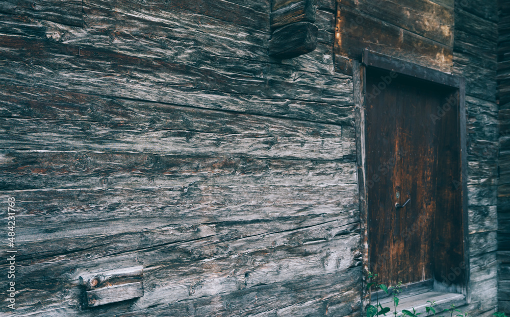 Weathered old wood texture background. Facade wooden house in village ...
