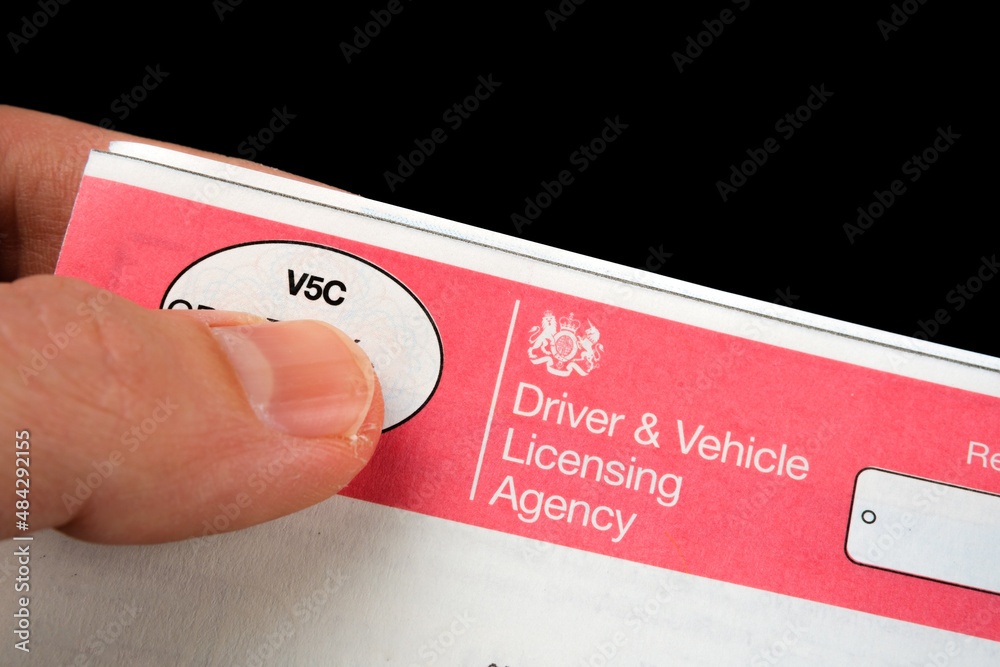 Genuine UK registration certificate for a purchased car seen on photo ...