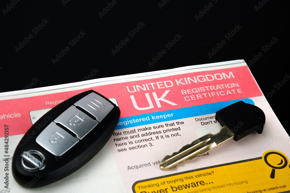 Genuine UK registration certificate for a purchased car seen on photo ...
