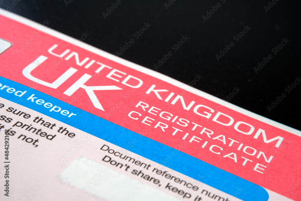 Genuine UK registration certificate for a purchased car seen on photo ...