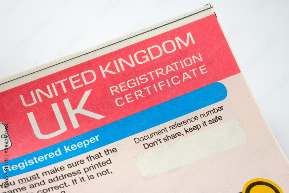 Genuine UK registration certificate for a purchased car seen on photo ...