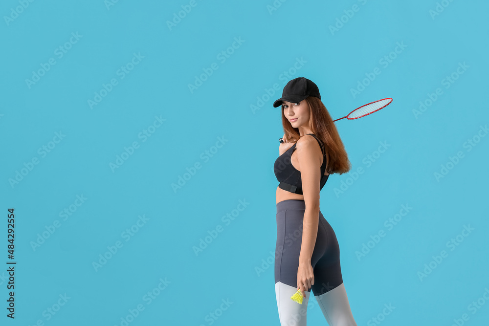 Sporty female badminton player on color background Stock Photo | Adobe ...