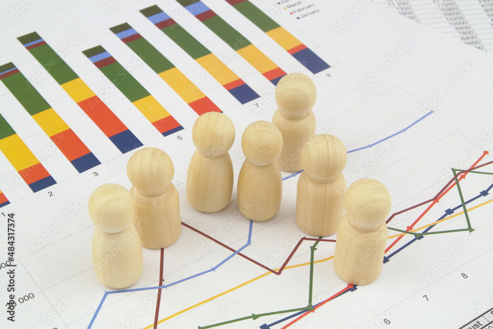 People and economy, demography and statistics concept. Wooden people ...