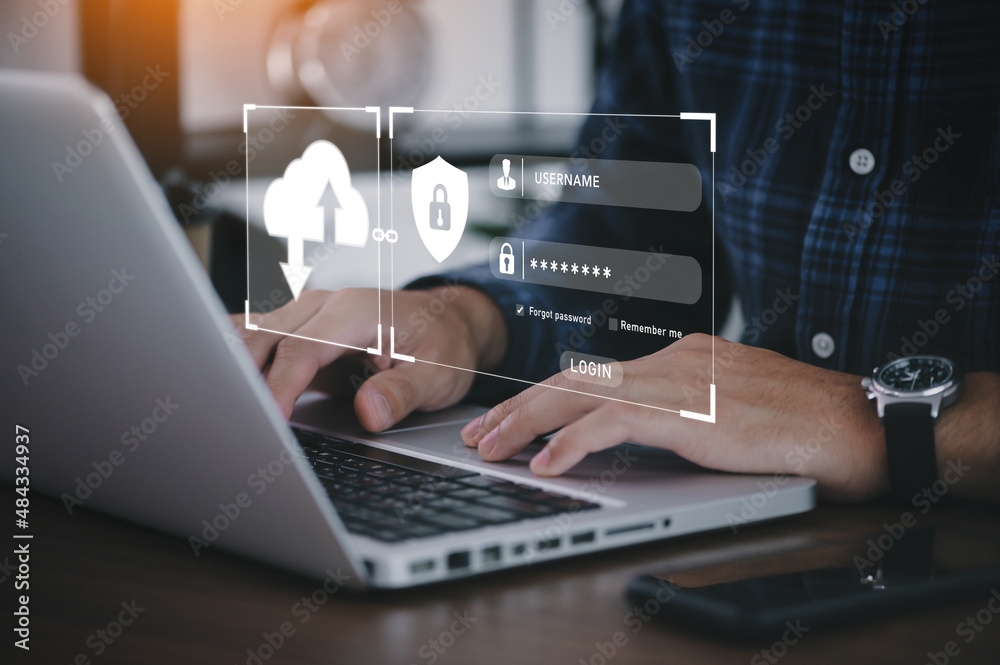 user typing login and password in the concept of cyber security ...