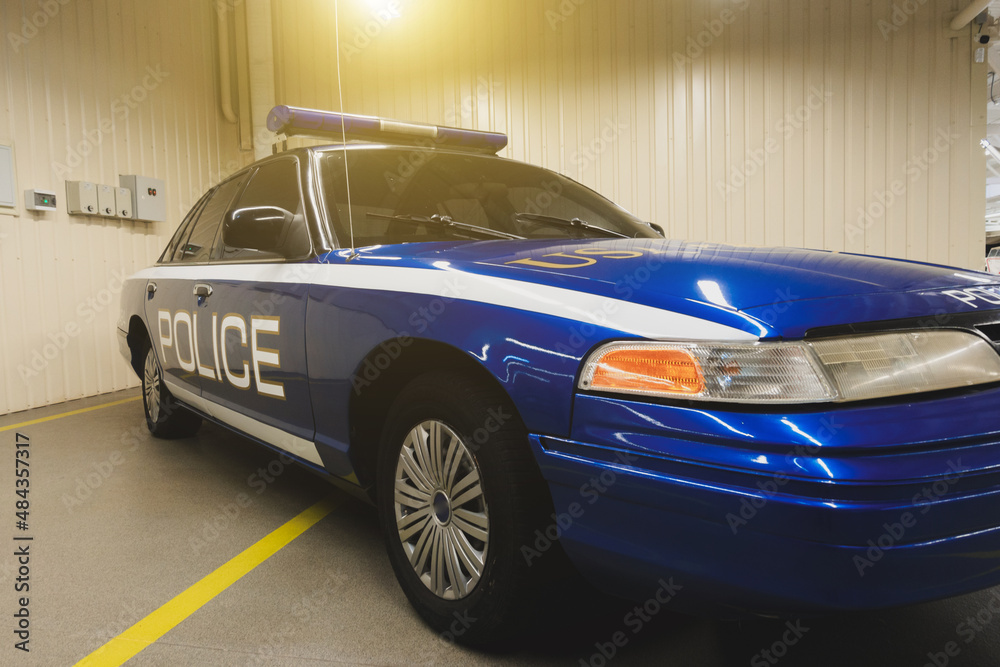 Blue police retro car with flashing lights on the roof Stock Photo ...
