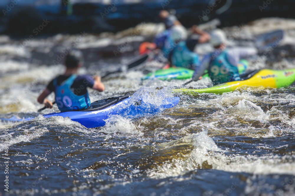 Kayak slalom canoe race in white water rapid river, process of kayaking ...