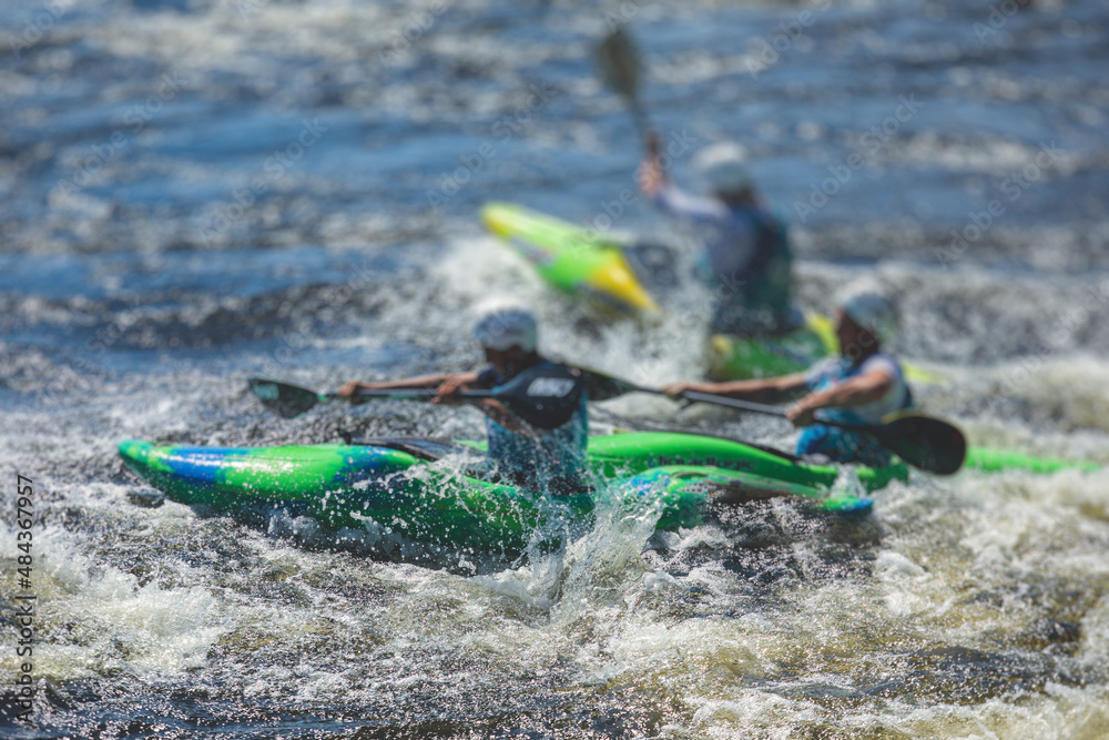 Kayak slalom canoe race in white water rapid river, process of kayaking ...