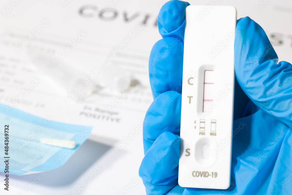 Positive test result using the COVID-19 rapid testing device, antibody ...