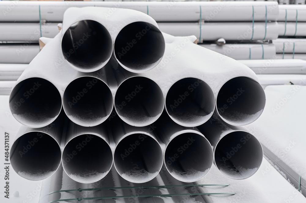 Stainless steel pipes are stacked, these pipes are for the food ...