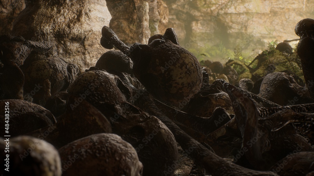Old bones, skulls and skeletal remains lie in a dark old and scary cave ...