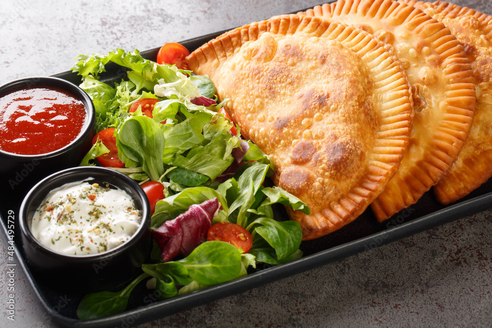 Chebureki is a national dish of Crimean Tatar cuisine maded with a ...