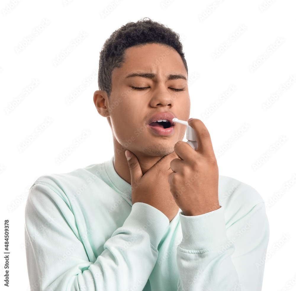 Ill African-American guy with inhaler on white background Stock Photo ...