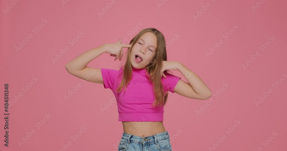 Stubborn naughty hooligan child girl sticking plug fingers in ears not ...