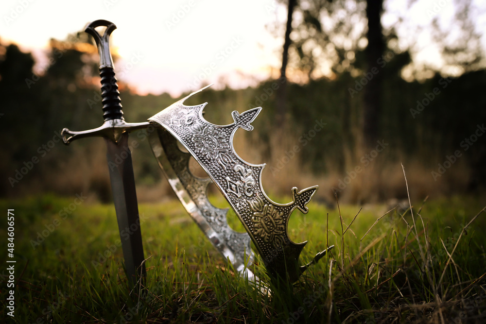 mysterious and magical photo of gold king crown and sword in the ...