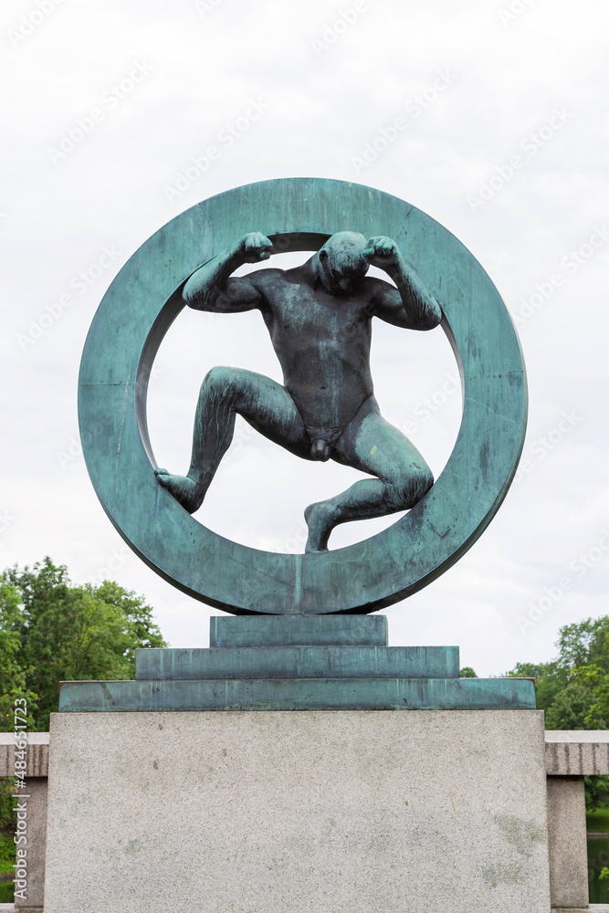 Sculpture of man inside a circle at Vigeland park Stock Photo | Adobe Stock