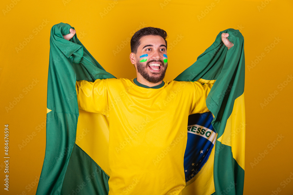 Brazilian man, latin american, cheering for brazil, in world cup 2022 ...