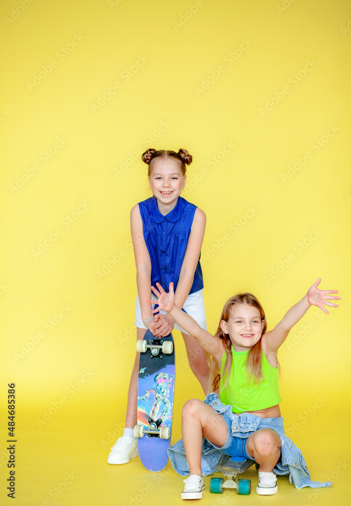 Funny little blonde girls 6-10 years old in everyday bright clothes ...