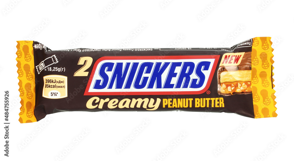 SNICKERS chocolate bar on white background. Snickers is a chocolate bar ...