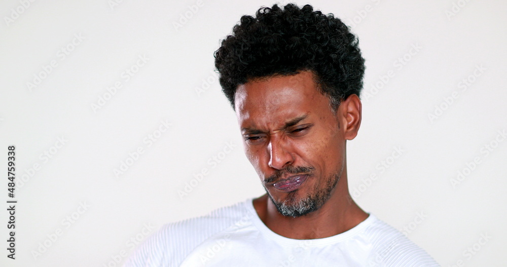 African man disgust face reaction. Black guy feeling dislike Stock ...