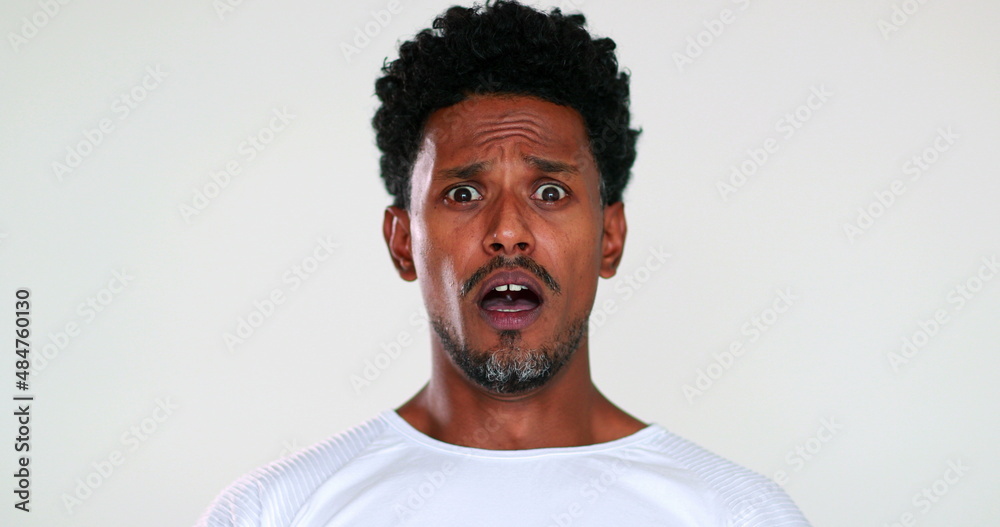 African american gradual shock reaction, face emotion black guy reacting with horror putting ...