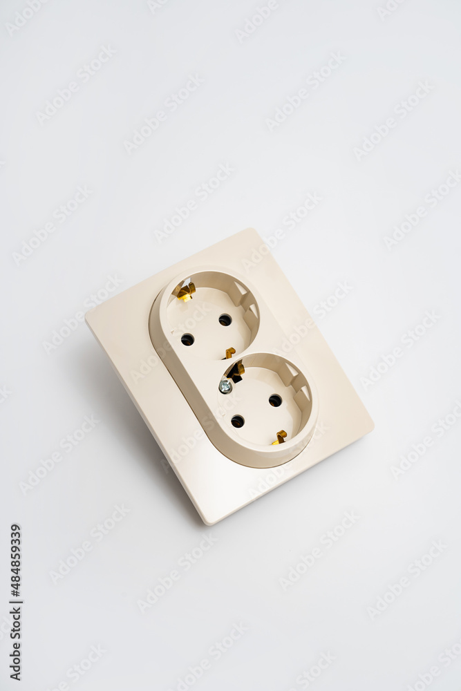 Double socket insulated on a white background. 2 sockets connected by ...