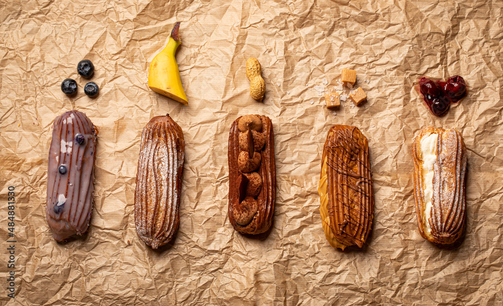 Poster Different types of delicious eclairs and their ingredients ...