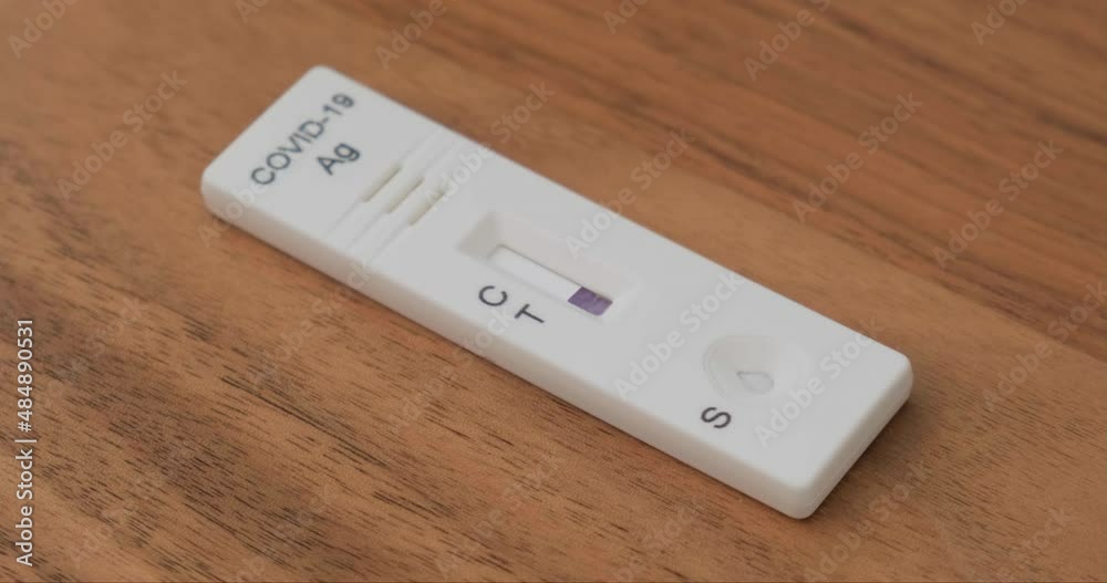 Coronavirus Covid-19 positive antigen test - close up of reaction ...
