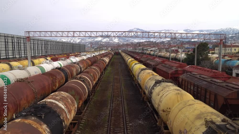 Freight trains parked at the railway station. the train is moving ...
