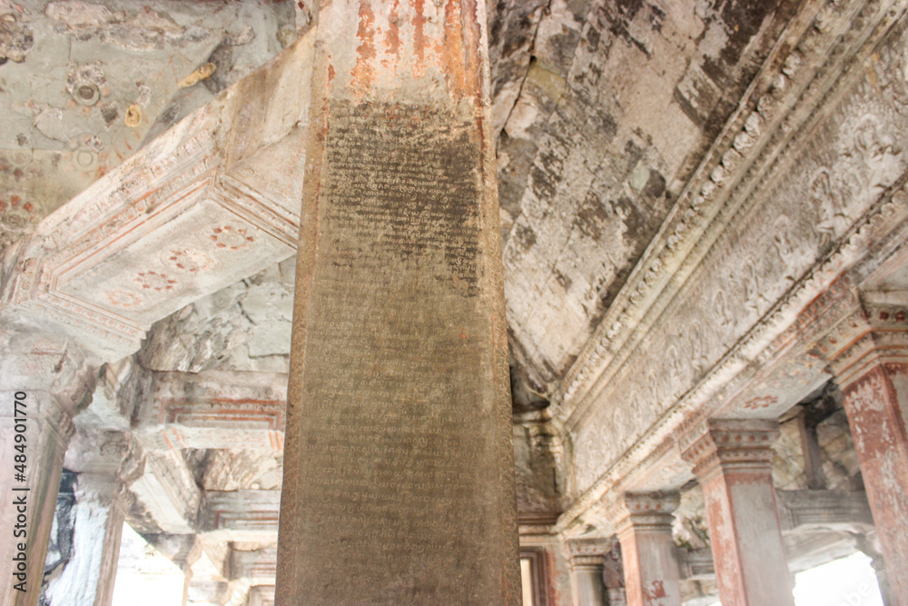 Ancient Khmer inscriptions carved on the walls of Angkor Wat ruins ...