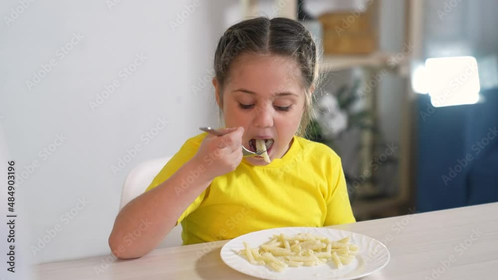 child eating pasta. healthy a food vegetarianism concept. girl child at ...