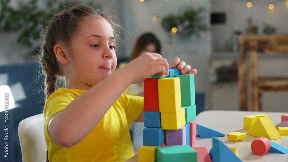 child play with cubes a toys blocks indoor. childhood kindergarten kid ...