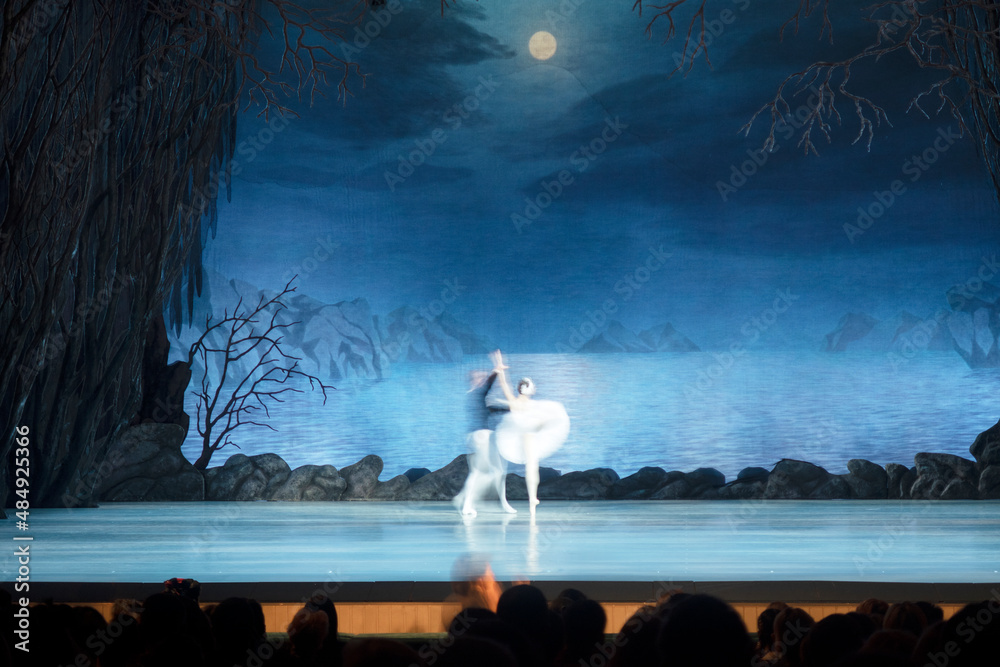 Classical ballet on stage of Theater. Ballet dancers on stage dance ...