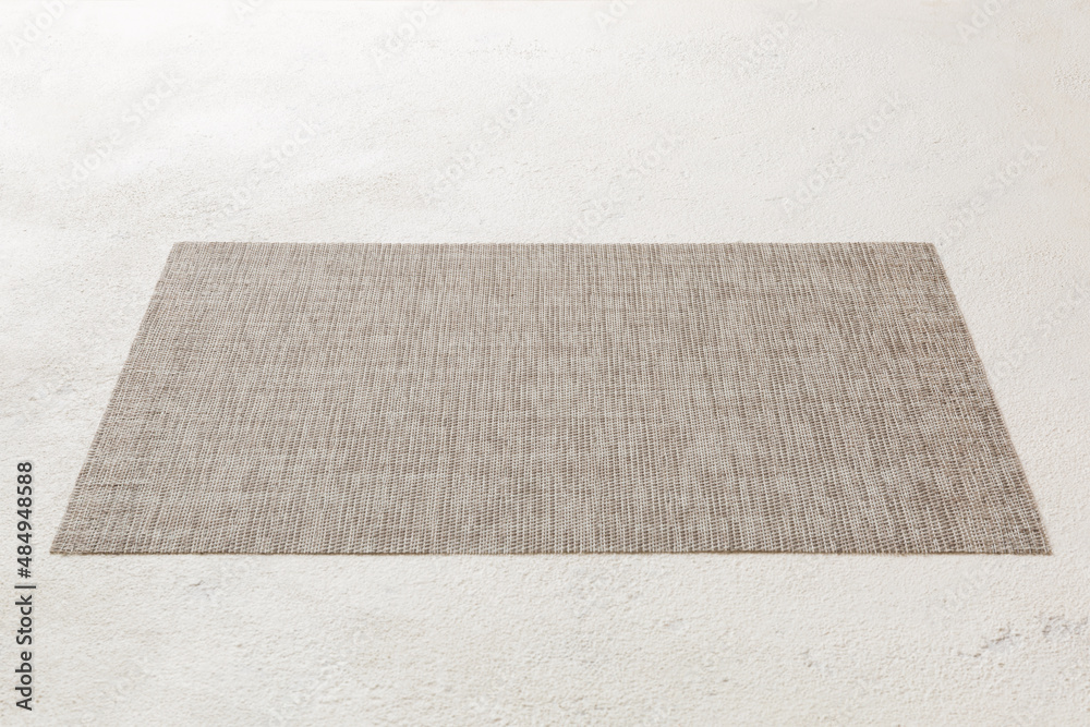 Perspective view of grey tablecloth for food on cement background ...