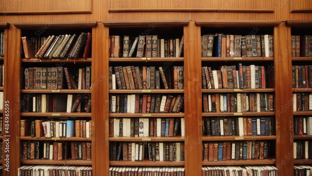 Modern Jewish library in Synagogue. Bookshelves with volumes ...