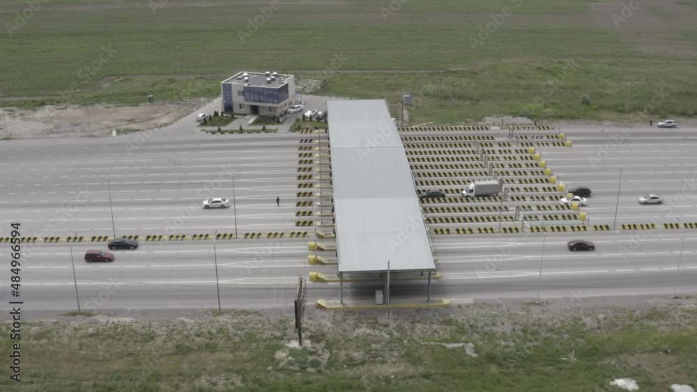 Aerial view of the toll station on the highway. Large highway toll ...