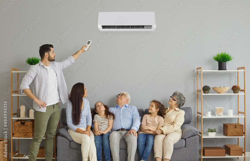 Happy family enjoying fresh air in cozy living room interior with new ... Happy family enjoying fresh air in cozy living room interior with new ...