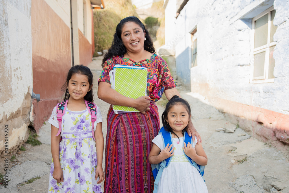 Hispanic mom and daughters ready to go to school - Latin mom ...