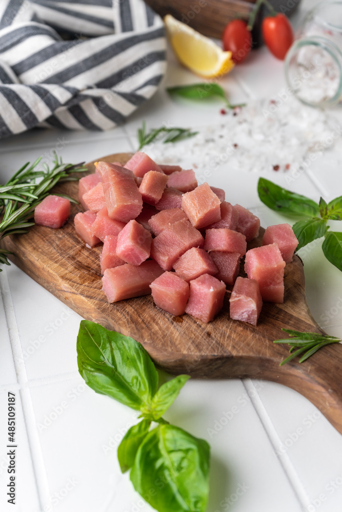 raw tuna fillet cut into cubes . marine predatory fish, family of ...