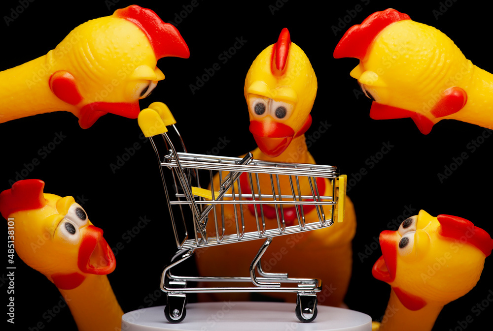 image of trolley rubber chicken dark background Stock Photo | Adobe Stock
