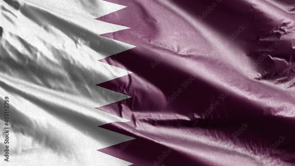Quatar textile flag slow waving on the wind loop. Qatari banner ...