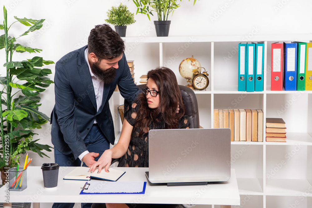 Professional woman feeling scared being harassed and touched by man ...