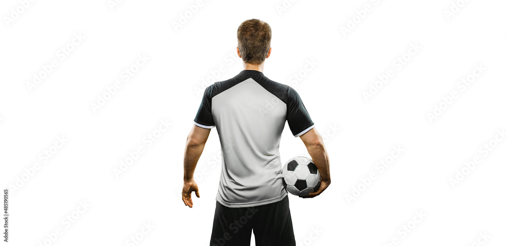 soccer player holding the ball with his back twisted. Isolated on the ...