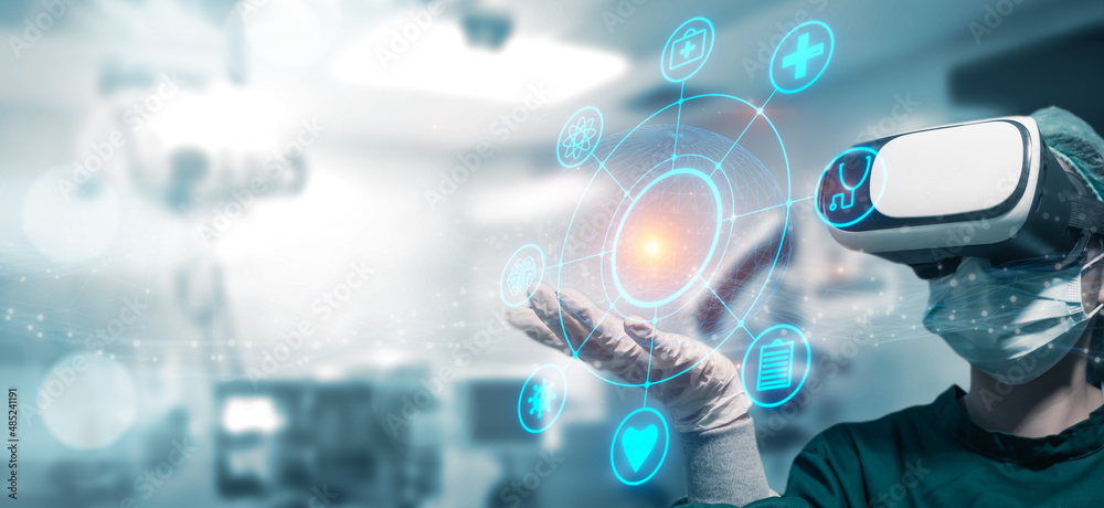 Female surgeon wearing VR UI simulation holographic icon infographic ...