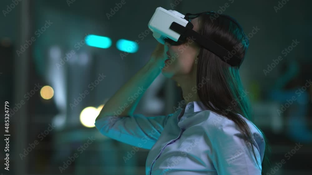 Businesswoman wearing vr headset working in office Stock Video | Adobe ...