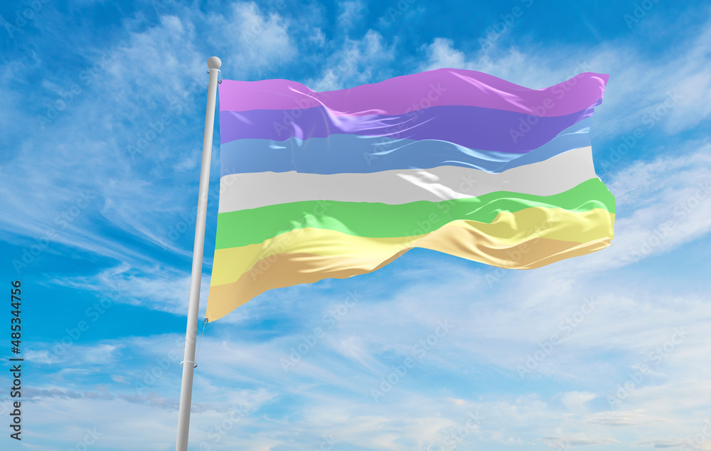 fae faer lesbian pride flag waving in the wind at cloudy sky. Freedom ...