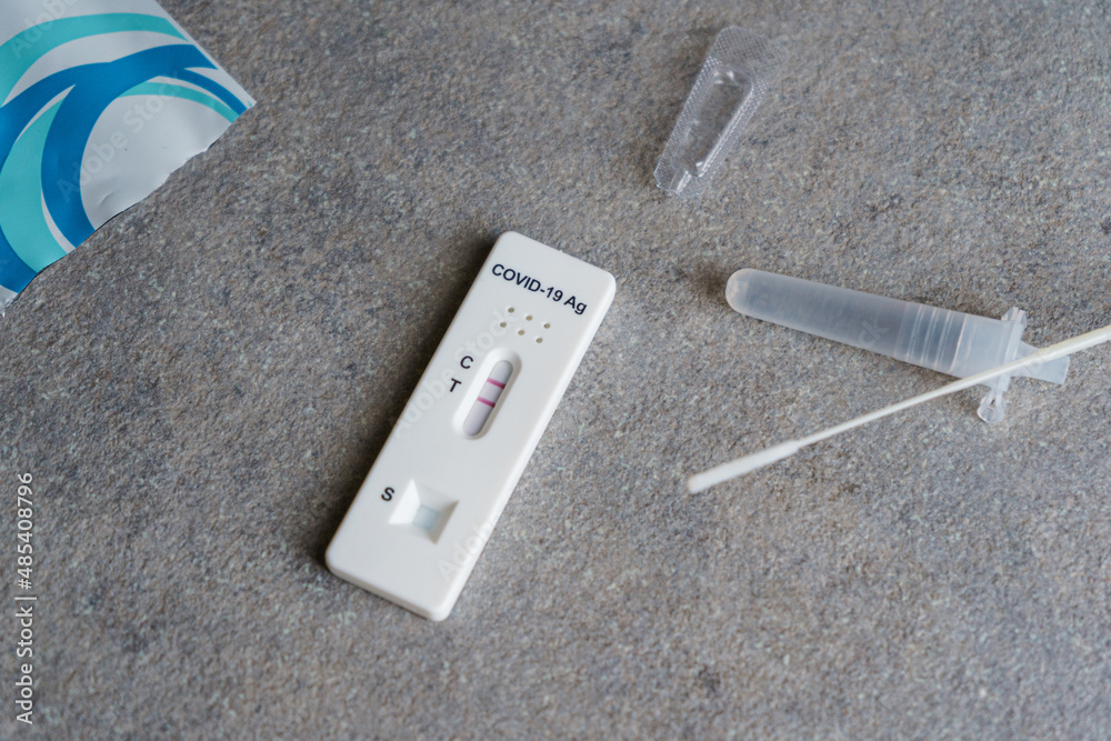 Covid-19 antigen test at home. Positive test result. Self testing rapid ...