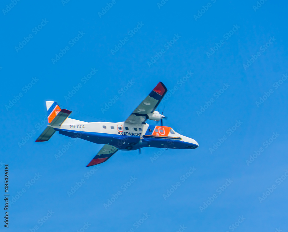 Dutch coast guard air plane flying in the sky, Surveillance and safety ...