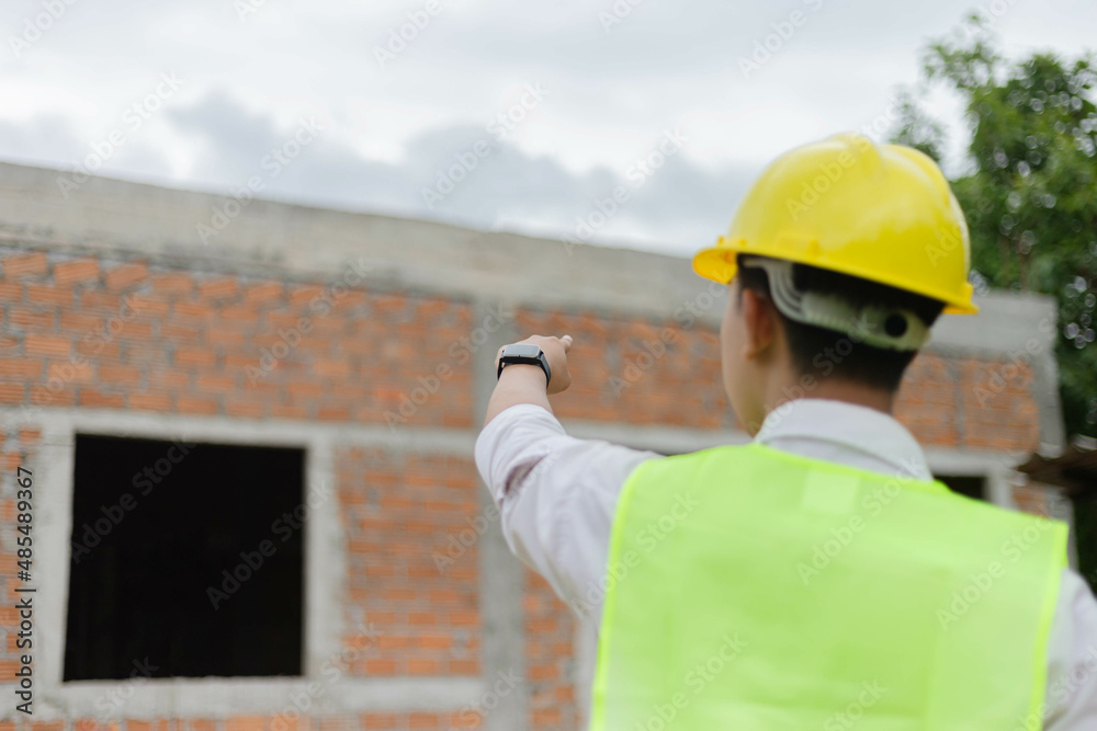 engineer concept The constructing guy looking at the construction site ...